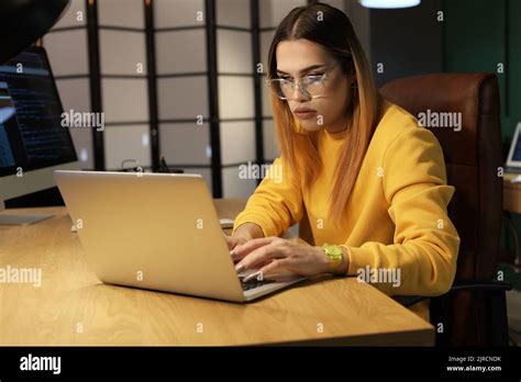 Transgender Programmer Working In Server Room Stock Photo Alamy