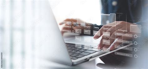 Business Developer Using Kanban Board Framework On Laptop Computer