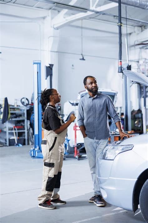 Specialist Shows Man Car Defects With Ar Stock Image Image Of
