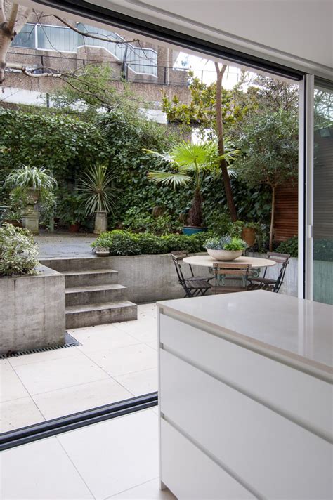 House Revamped By William Tozer Associates To Match Brutalist Neighbour