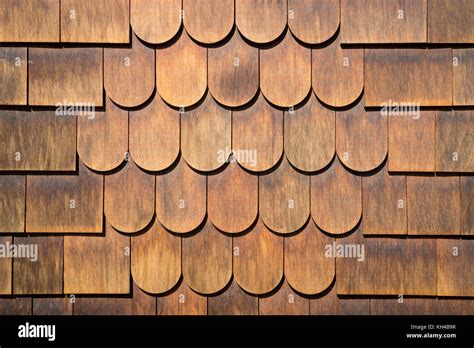 Abstract Close Up View Of Classic Half Rounded Cedar Shingle Siding