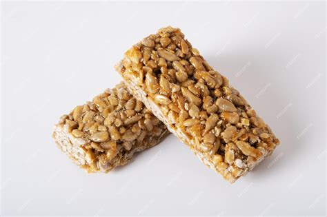 Premium Photo Kozinak From Sunflower Seeds On A White Background