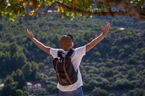 Premium Photo Back View Of Unrecognizable Male Hiker With Rucksack