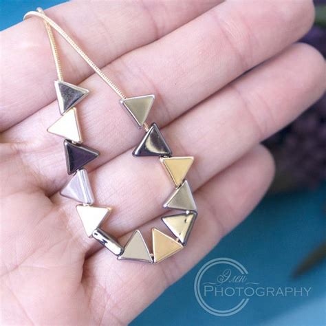 Намисто з трикутниками — ціна 65 грн у каталозі Кольє і намиста Купити аксесуари за доступною