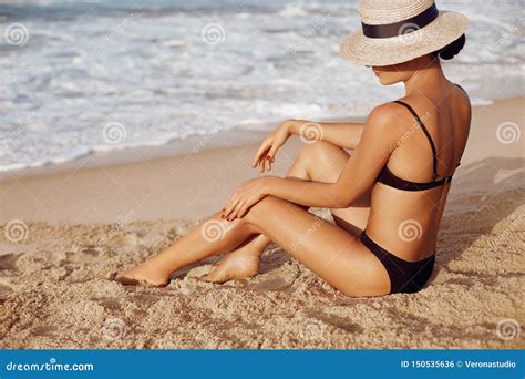 Beauty Woman Applying Sun Cream Lotion On Legs Skin Cream A Female