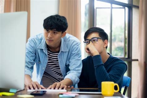 Premium Photo Programmers And Developer Teams Are Coding And