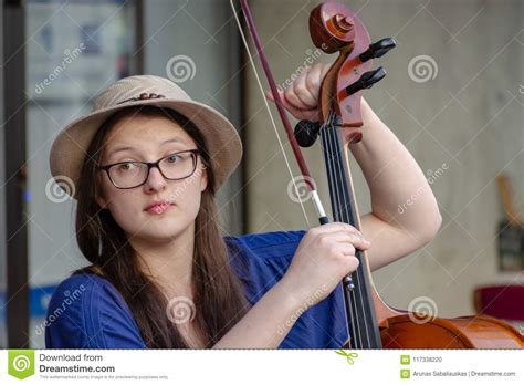 Young Lady Is Tuning Cello Editorial Image Image Of Playing 117338220