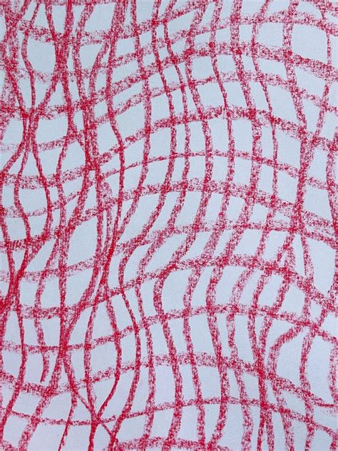 Red Crayons Draw A Pattern Resembling A Tangled Web Or Fibers On A