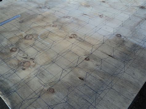 Archduke Piccolo Marking Up A Hex Grid Game Board