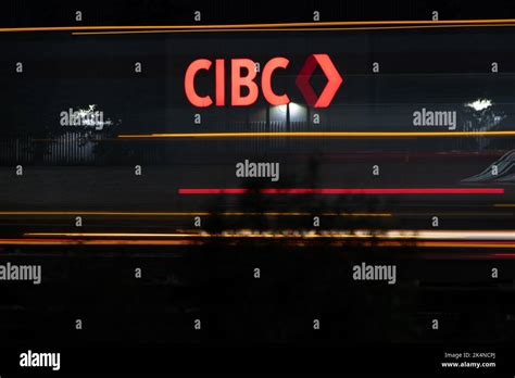 The Cibc Logo Illuminated On A Sign Seen At Night Along A Busy Highway Cibc Canadian Imperial