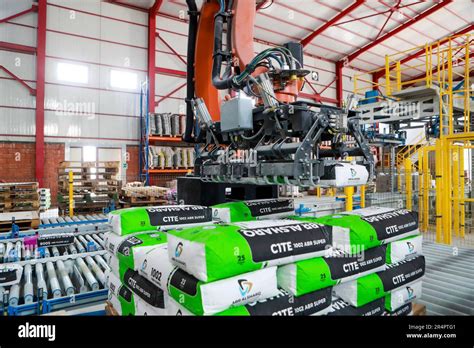 Robot Arms At The First Robot Run Factory To Produce Construction Adhesive Materials In Basra