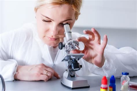 Premium Photo Woman Working With A Microscope In Lab