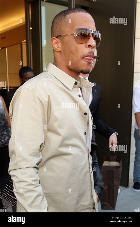 Rapper Ti Shopping At Louis Vuitton On Rodeo Drive In Beverly Hills
