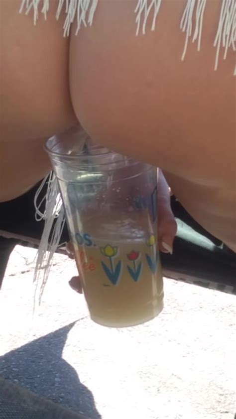 Pissing In Cup In Parking Lot