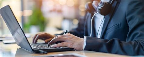 A Man Is Typing On A Keyboard With A Stethoscope On The Keyboard Premium AI Generated Image