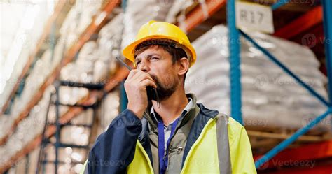 Construction Worker Communicating In Warehouse Environment 77591052