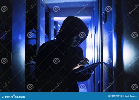 Ill Crack Into This System Within Seconds A Hacker Using A Digital Tablet In A Server Room