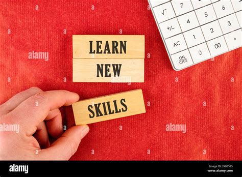 learn new skills symbol wooden blocks beautiful red background the