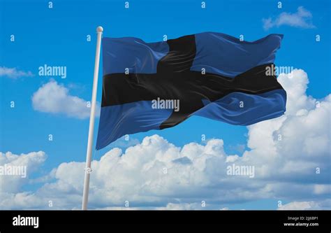 Official Flag Of Greek Black Cross Greece At Cloudy Sky Background On