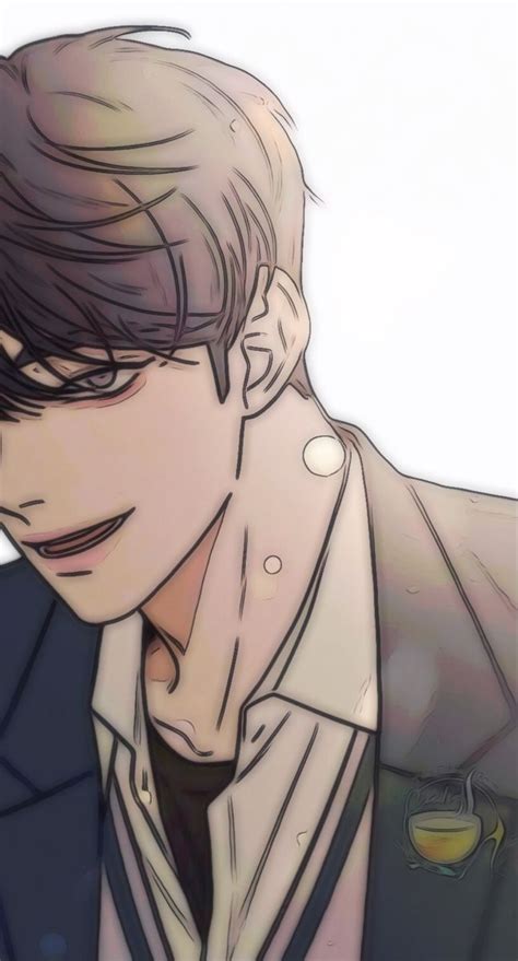 A Man With Glasses Is Looking Down At His Cell Phone