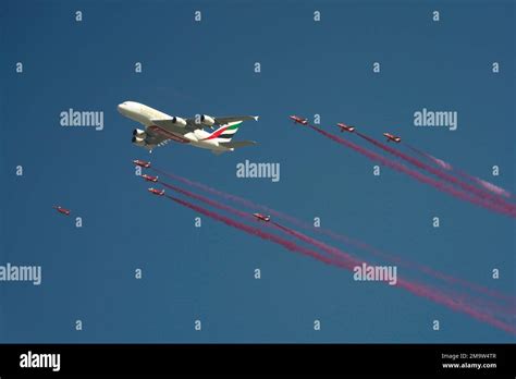 An Emirates Airbus A380 Flies Over Downtown Dubai United Arab Emirates