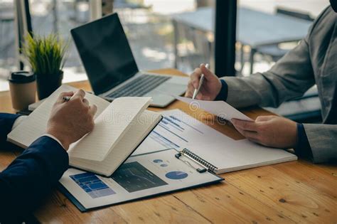 Business Team Analyzing Data Using Computer While Spending Time In Office Financial Planning