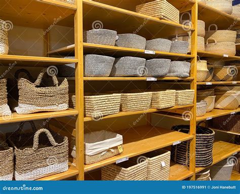 A Display Of Beautiful Baskets At The Container Store Retail Organizing