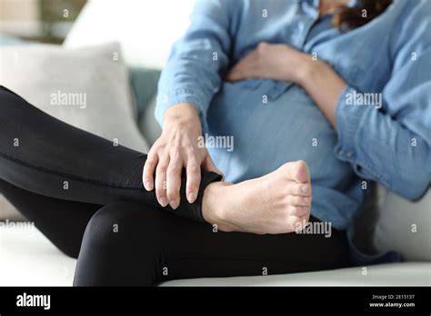 Hand Grabbing Ankle Hi Res Stock Photography And Images Alamy