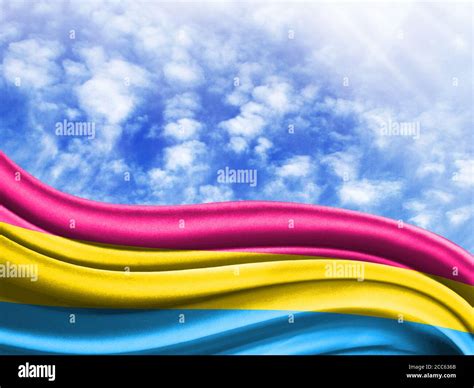 Pansexuality Pride Flag Against The Sky With Place For Text Stock