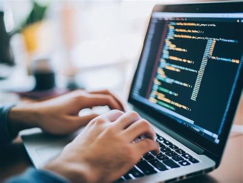 A Person Coding A Project On A Laptop Premium Ai Generated Image