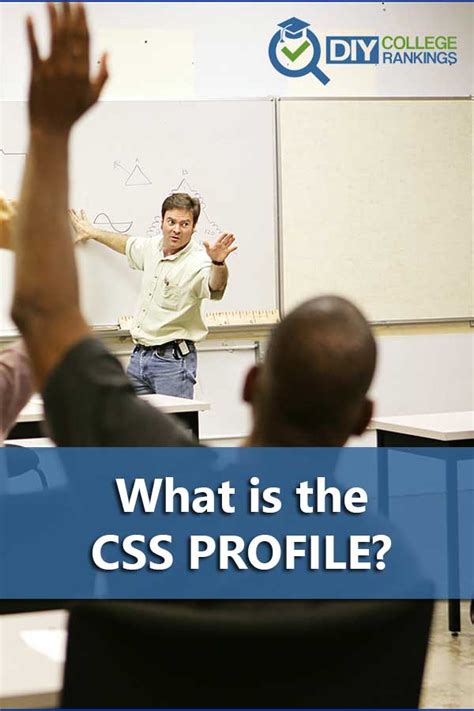 A Teacher At The Front Of A Classroom Points To A Whiteboard While A