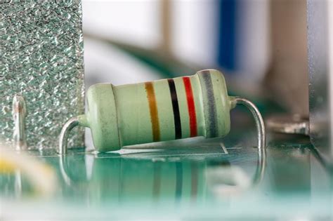 Premium Photo Macro Shot Of A Resistor Soldered Into A Green Digital