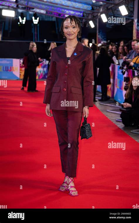 Jesse Akele Poses For Photographers Upon Arrival For The Premiere Of The Film Allelujah During