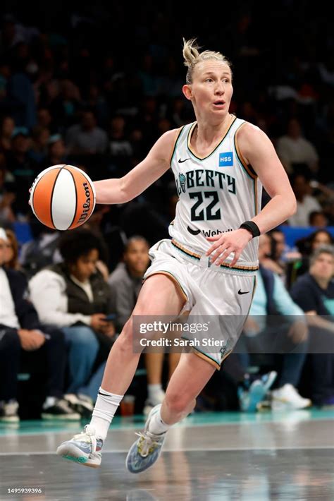 Courtney Vandersloot Of The New York Liberty Dribbles During The