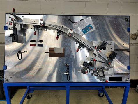 CHECKING FIXTURE PRECISION MEASUREMENT AND DESIGN INC