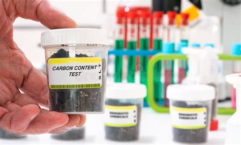 Carbon Carbon Content In Soil Sample In Plastic Container Stock Image