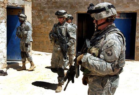 Soldiers Armed With M4 Carbines W Grenade Launchers Of The 1st