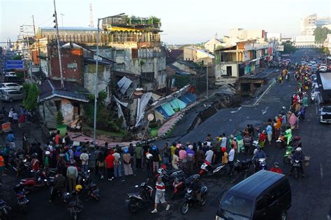 Shophouses Collapse In East Java After River Overflows Eroding