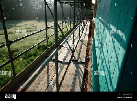 Scaffolding Framework Around A Modern Timber Framed Building Stock