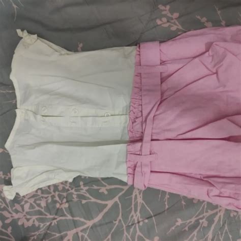 کمدا قیمت و خرید پیراهن دخترانه رنگ صورتیسفید سایز 9 الی 14 ماه