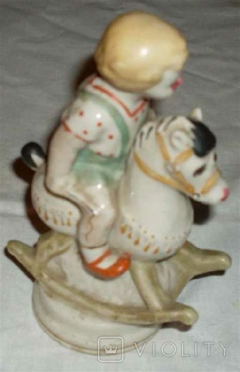 Фарфоровая статуэтка Мальчик на лошадке 109550496 купити Violity