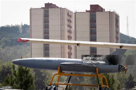 A Truck Is Carrying An Iranian Made Unmanned Aerial Vehicle During A