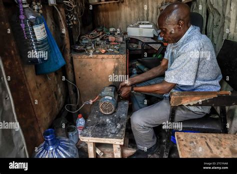 Samwel Mwangi Making Jewelries At His Shop In Kibera Slum On October 25 2023 In Nairobi Kenya