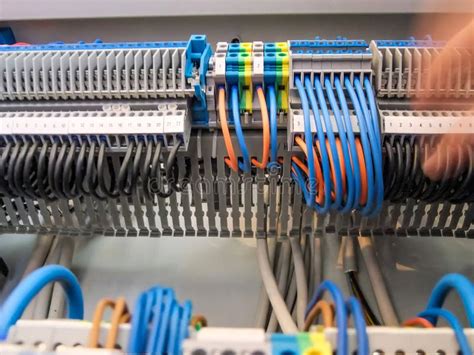 neatly organized wiring shows black blue and orange wires connected