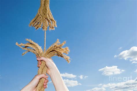 Holding On To A Fraying Rope Photograph By Conceptual Images Pixels