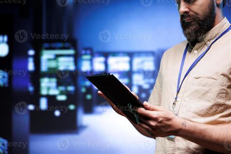 specialist inspecting interlinked computers creating server network
