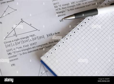 Handwriting Of Geometrical Tasks On Examination Practice Quiz Or Test In Geometry Class