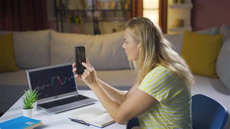 The Woman Who Follows The Crypto Exchange Makes Calculations Stock Video At Vecteezy