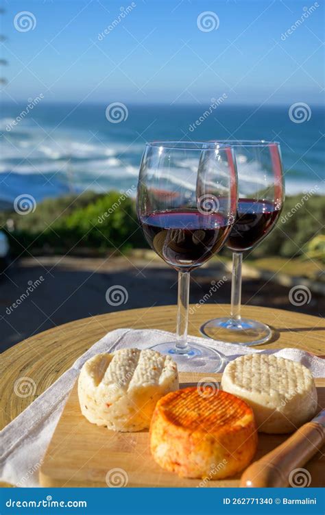 Food And Wine Pairing Red Dry Portuguese Wine And Variety Of Goat Sheep Cow Cheeses Made With