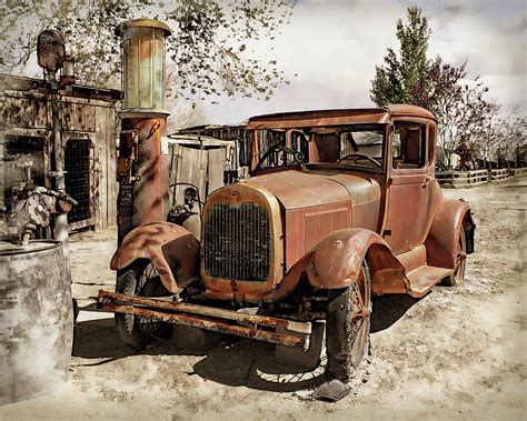Rusty Model A Photograph By Jerry Cowart Pixels